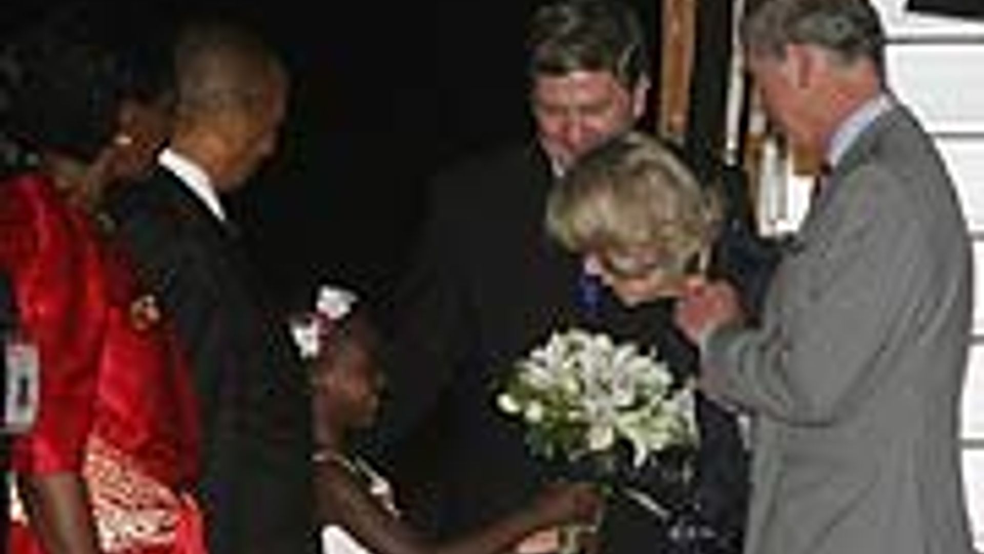 Compassionate Queen makes moving visit to Uganda AIDS clinic | HELLO!