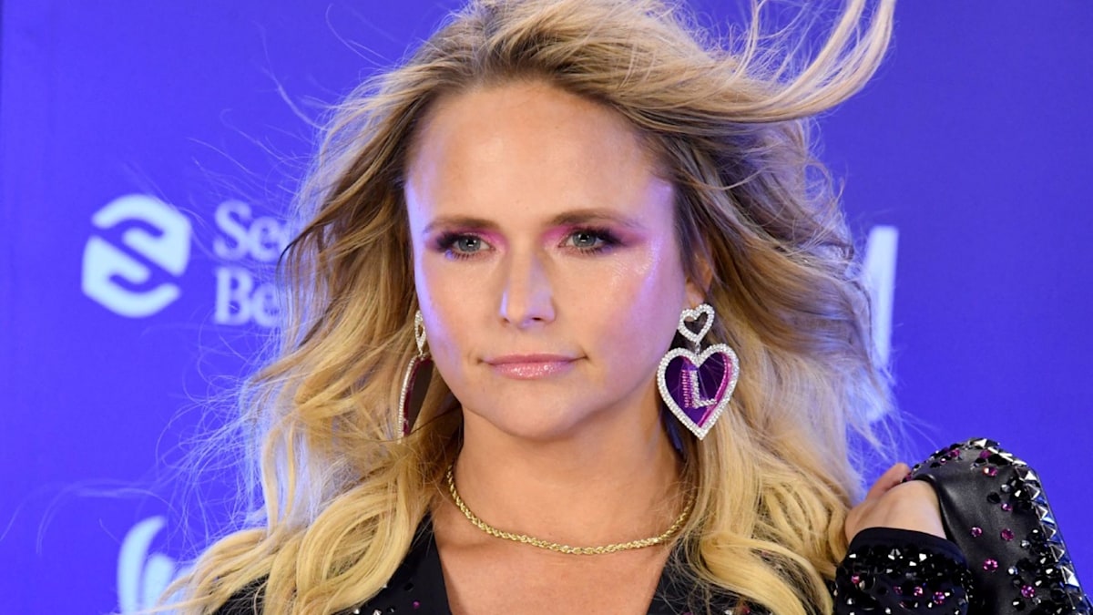 Miranda Lambert poses in denim mini-skirt and fringe as she shares ...