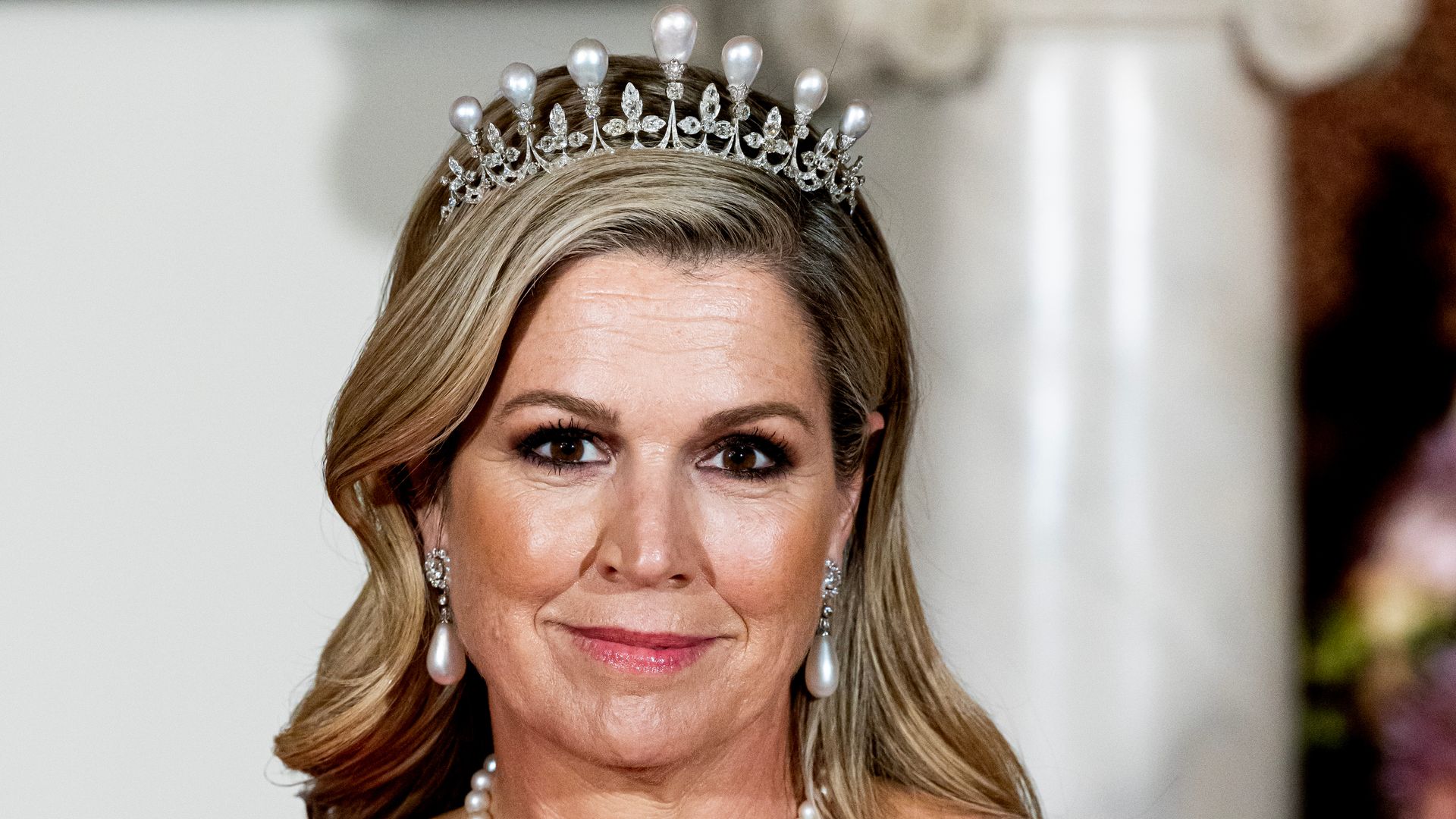 Queen Maxima sparkles in striking diamond tiara and off-shoulder gown ...