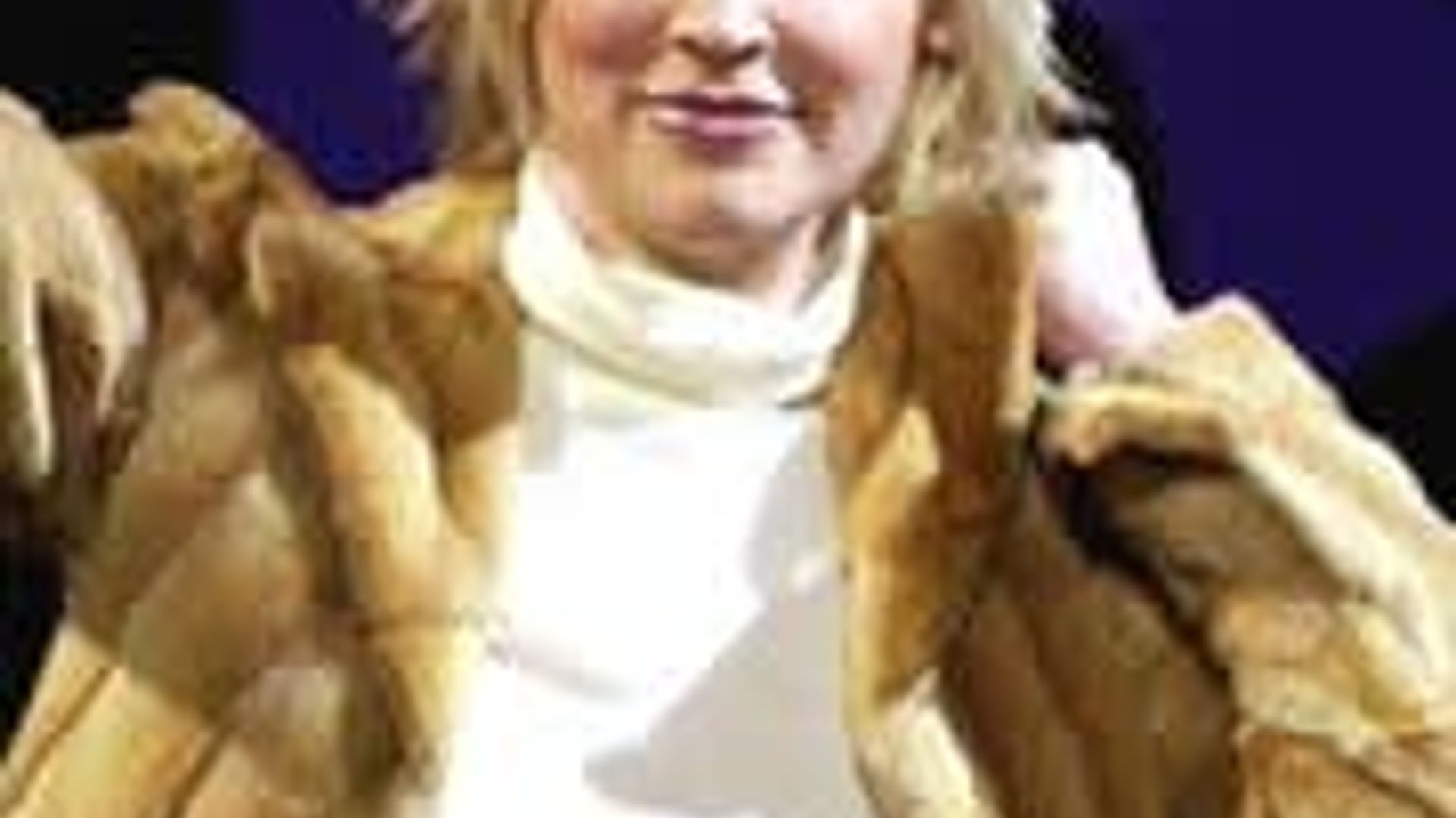 FEMALE BIDDER PAYS £35,000 TO KISS SHARON STONE | HELLO!