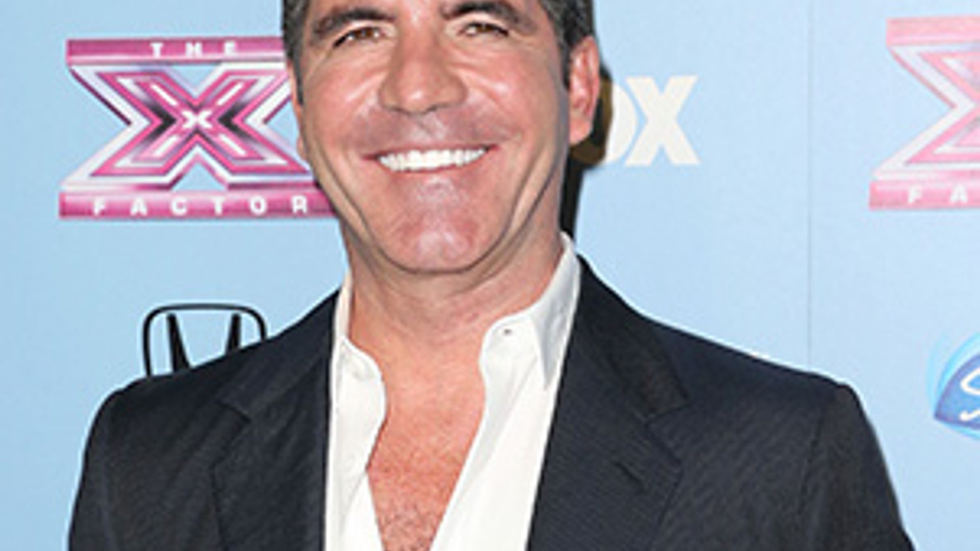 Simon Cowell - Biography | HELLO!