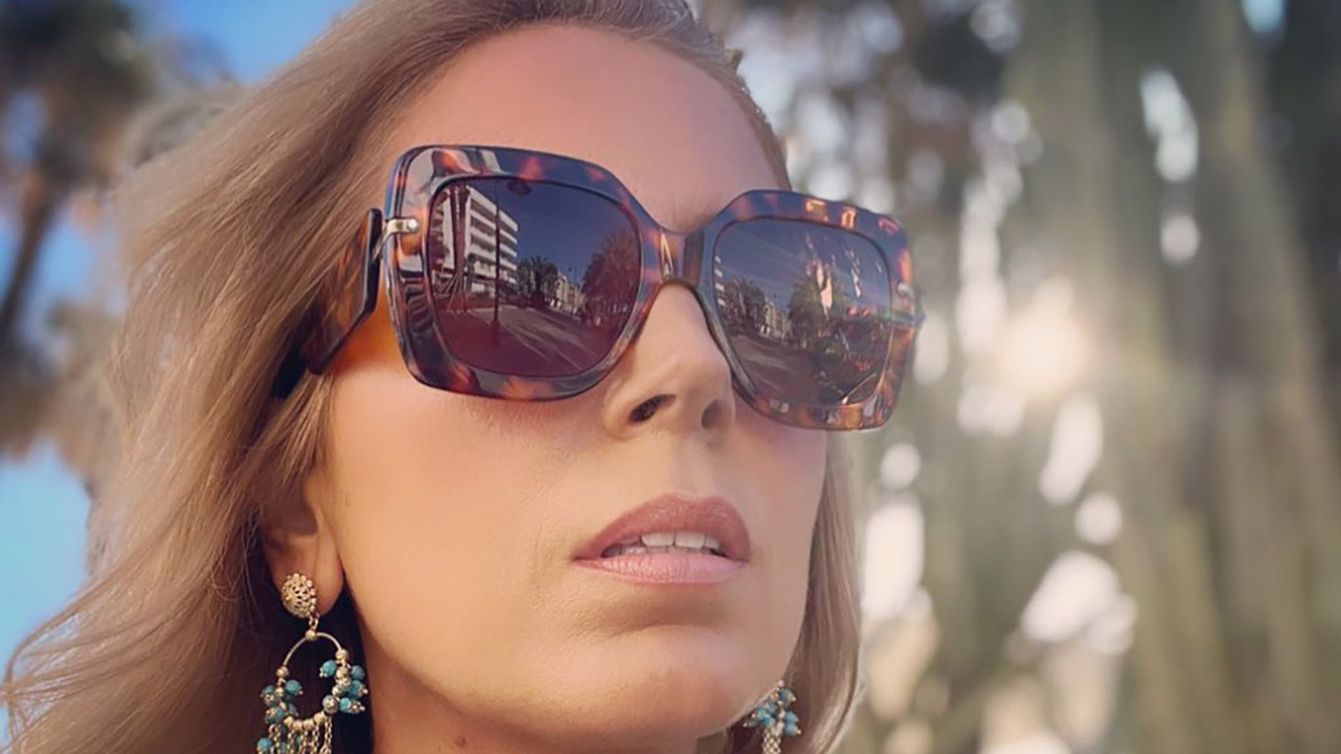 A Place in the Sun's Jasmine Harman stuns in strapless leopard swimsuit ...