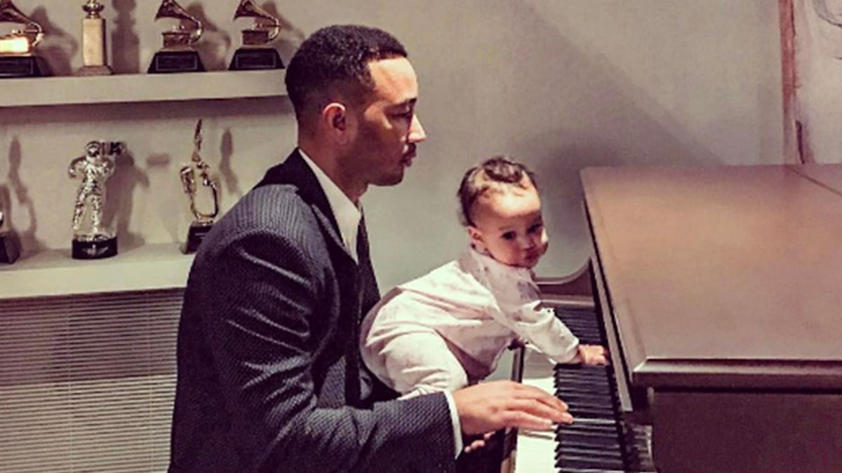 John Legend practises for the Oscars, with a little help from his baby ...