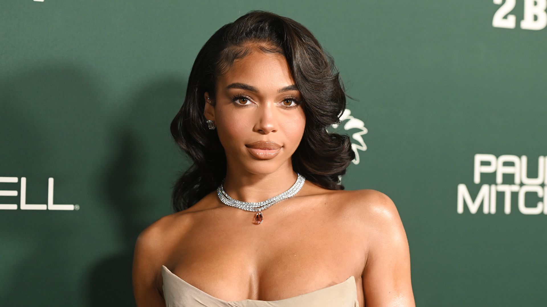 Steve Harvey's youngest daughter Lori Harvey makes a splash in metallic string bikini for SI ...