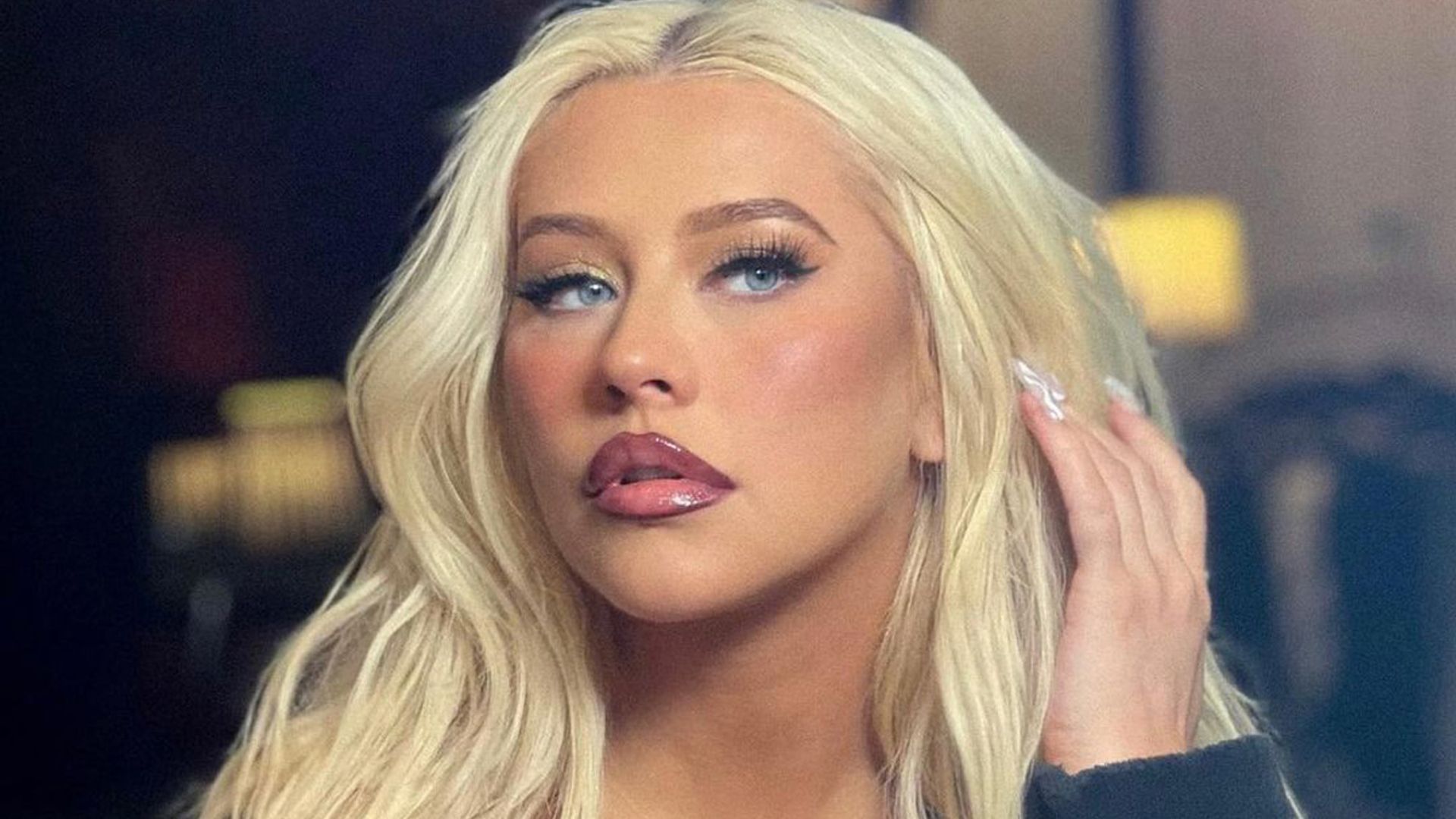 Christina Aguilera Turns Up The Heat In Deep V Bodysuit And Leather