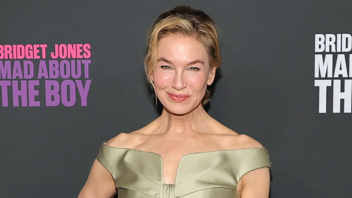 Renée Zellweger disguises engagement ring finger in unique way during dazzling red carpet ...