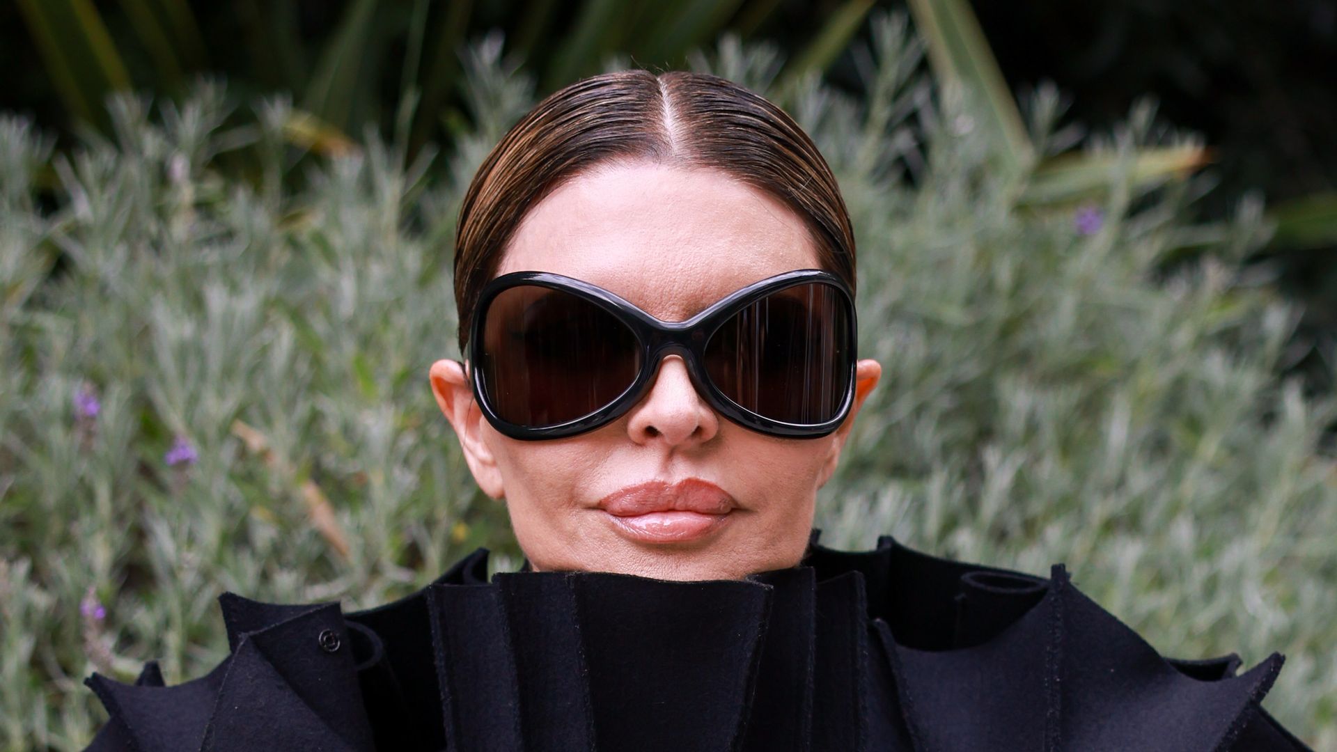 Lisa Rinna is a goddess as she makes announcement in busty leather ...