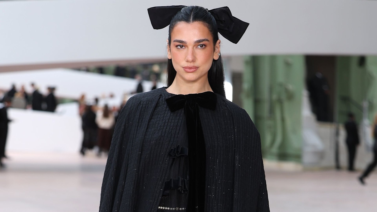 Dua Lipa dazzles in operatic cape at Chanel Haute Couture show | HELLO!