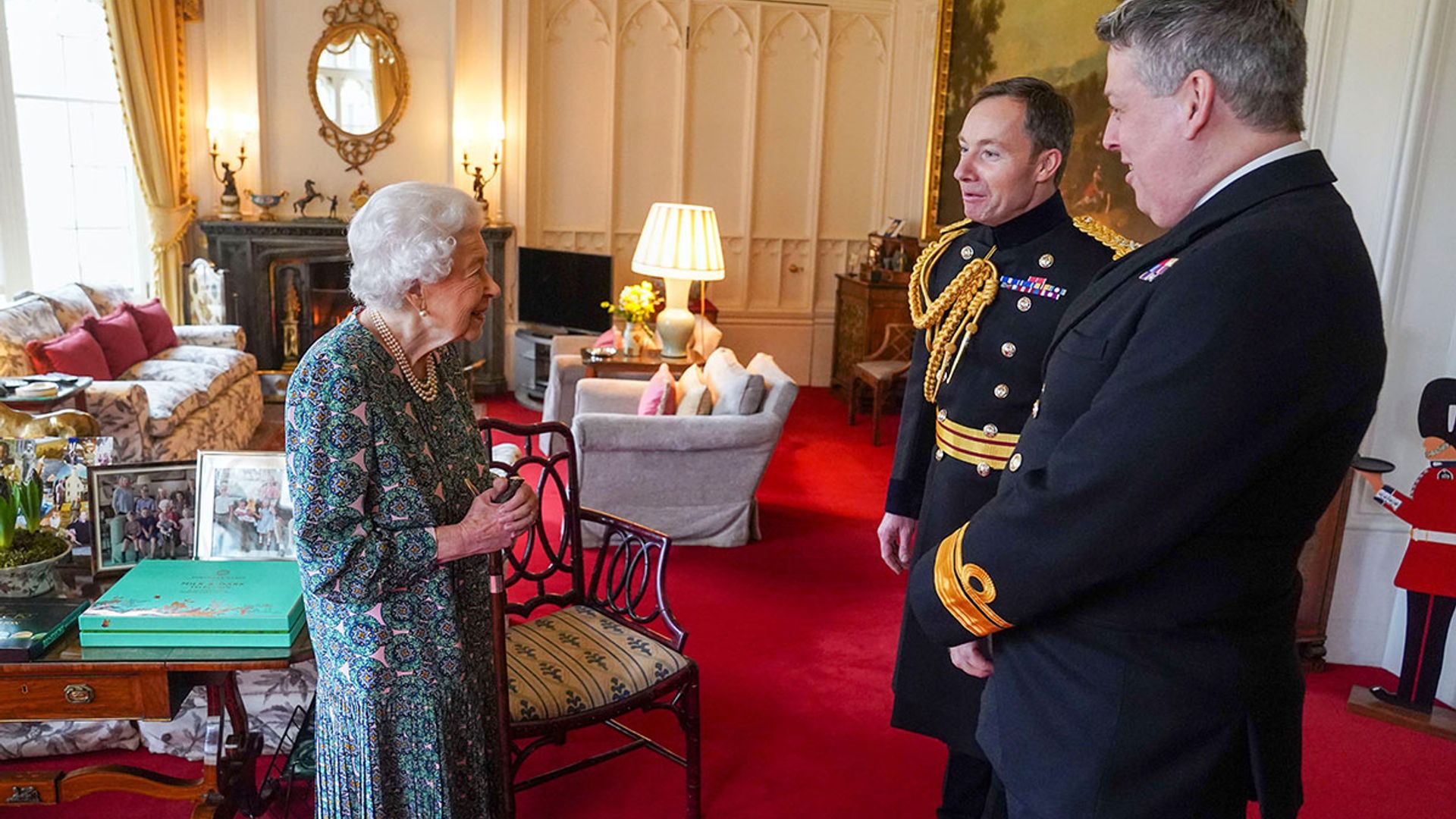 The Queen holds Zara Tindall's son Lucas in previously unseen family ...