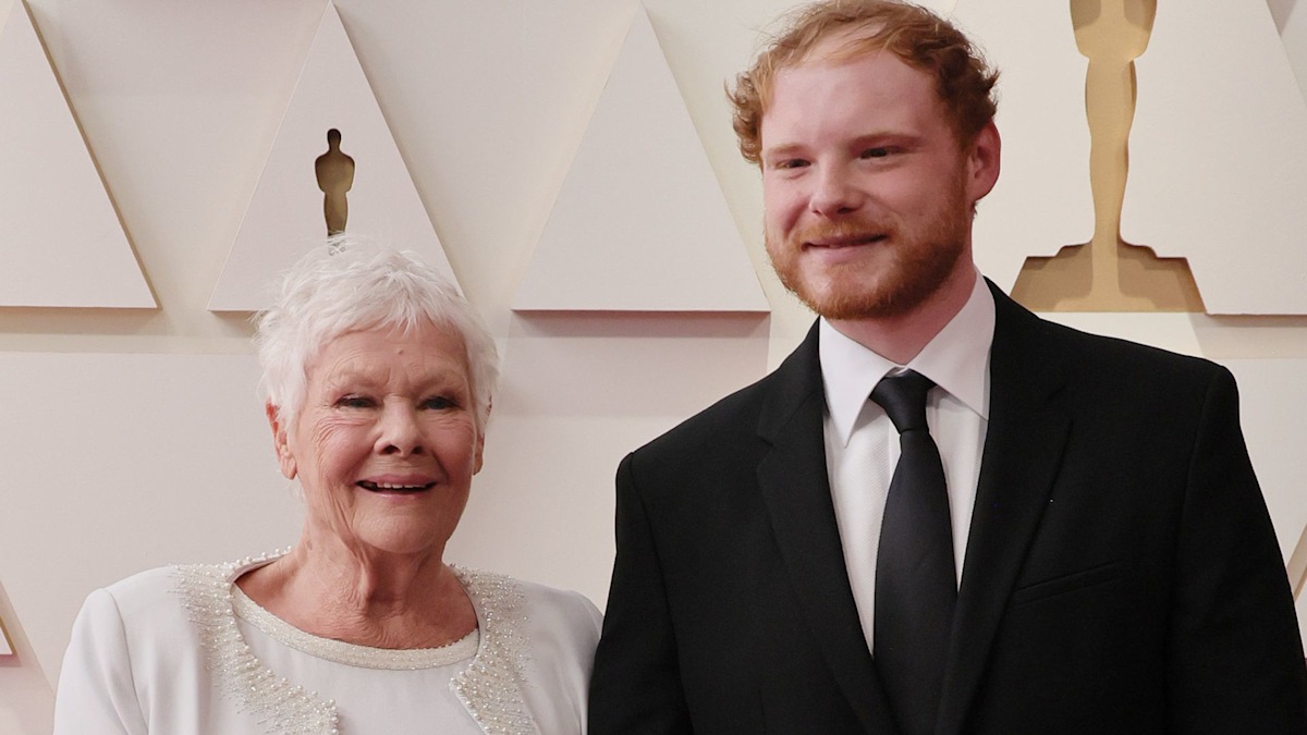Dame Judi Dench's red-haired grandson Sam, 26, pictured in rare photos ...