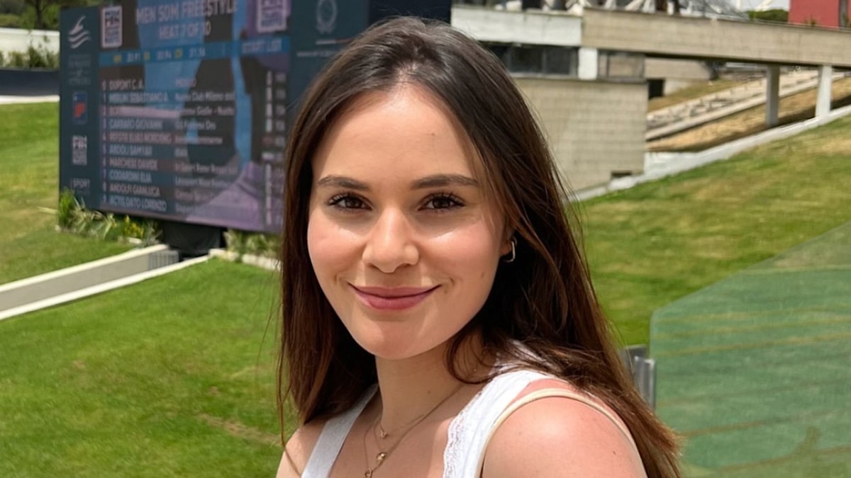 Holly Ramsay looks ultra-chic in a pleated mini skirt to cheer on Adam Peaty | HELLO!