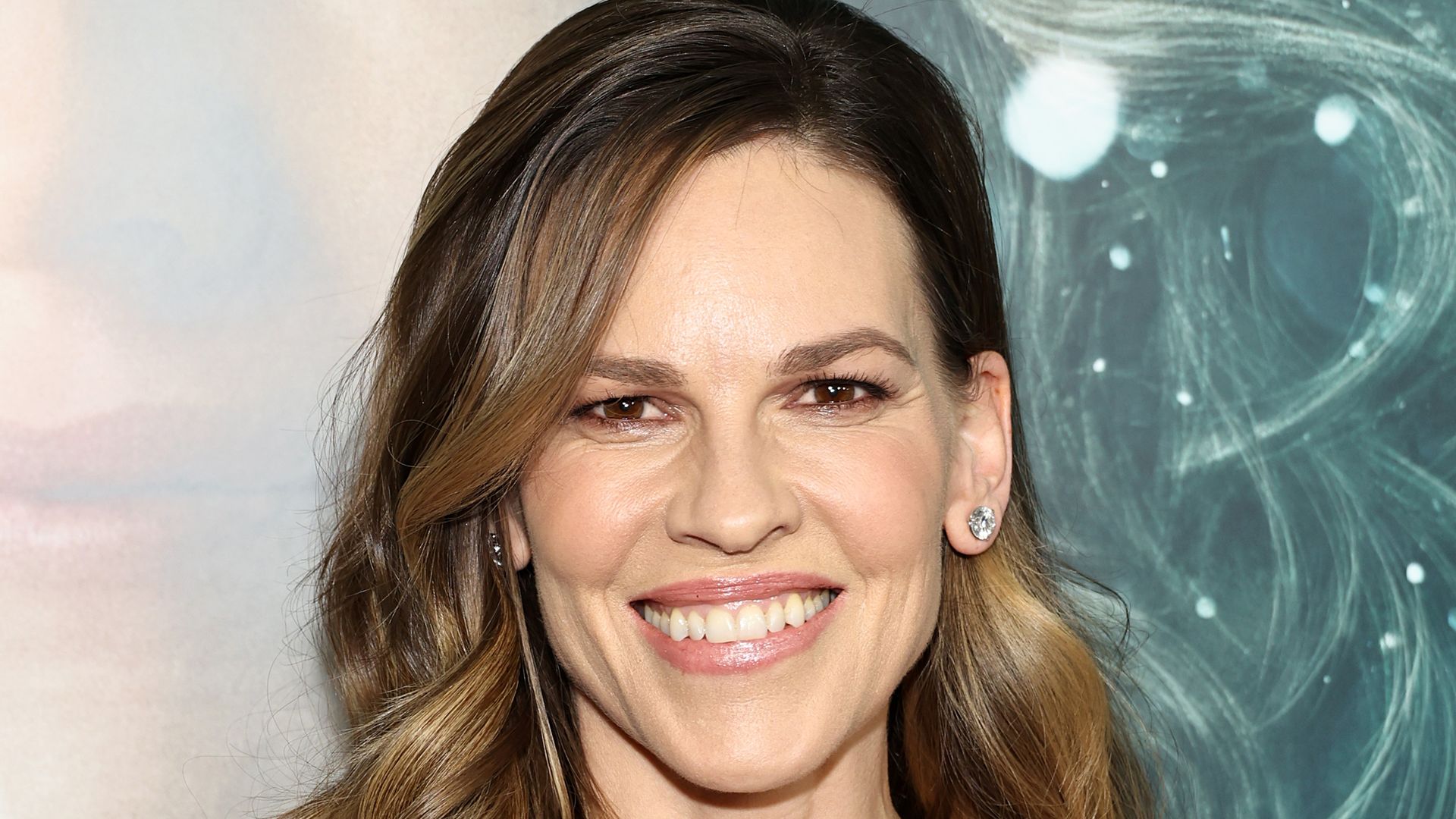 Hilary Swank, 49, sizzles in waist-cinching red gown in head-turning ...