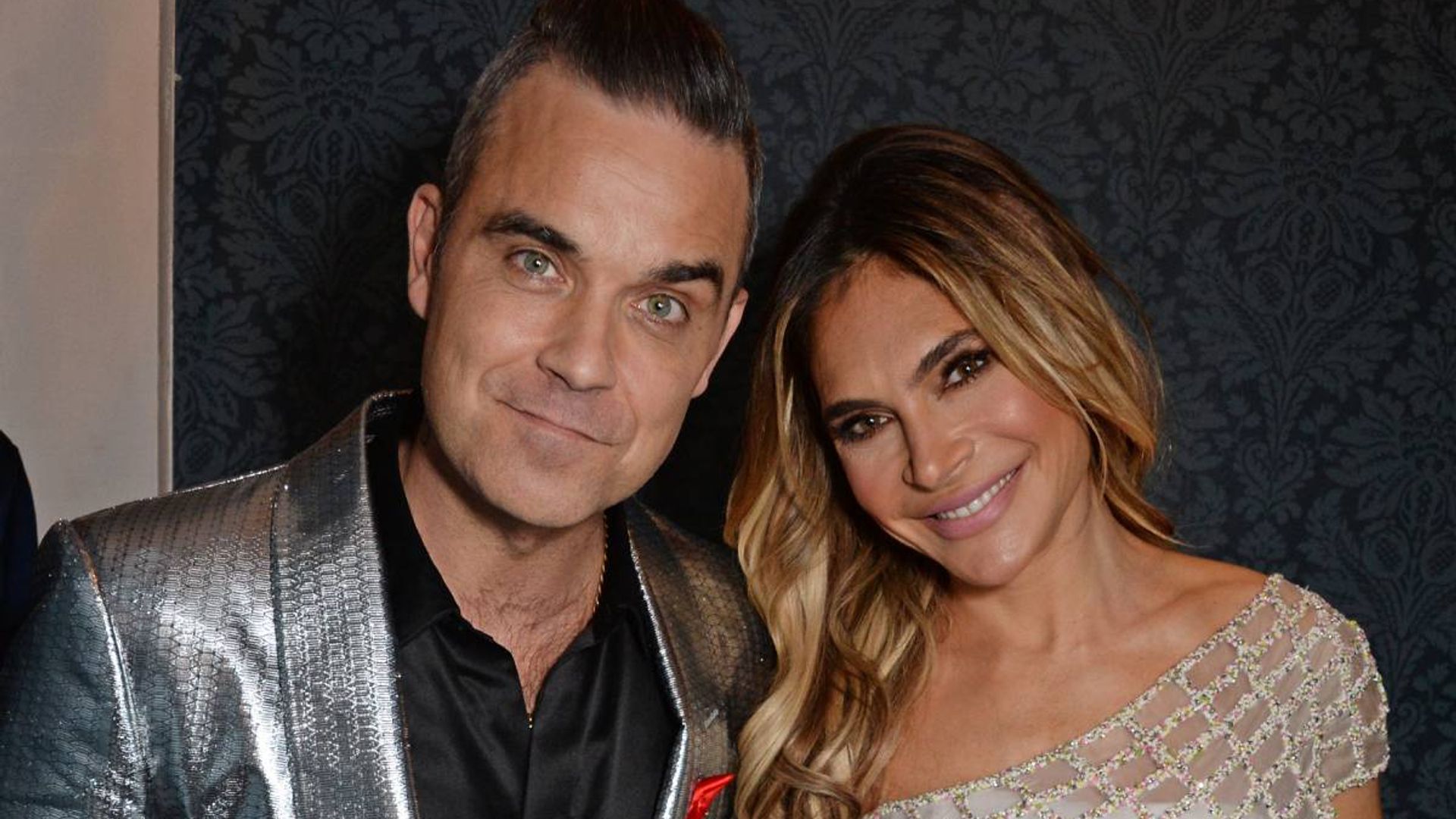 Robbie Williams' son Charlie seen in RARE photo as his famous parents ...