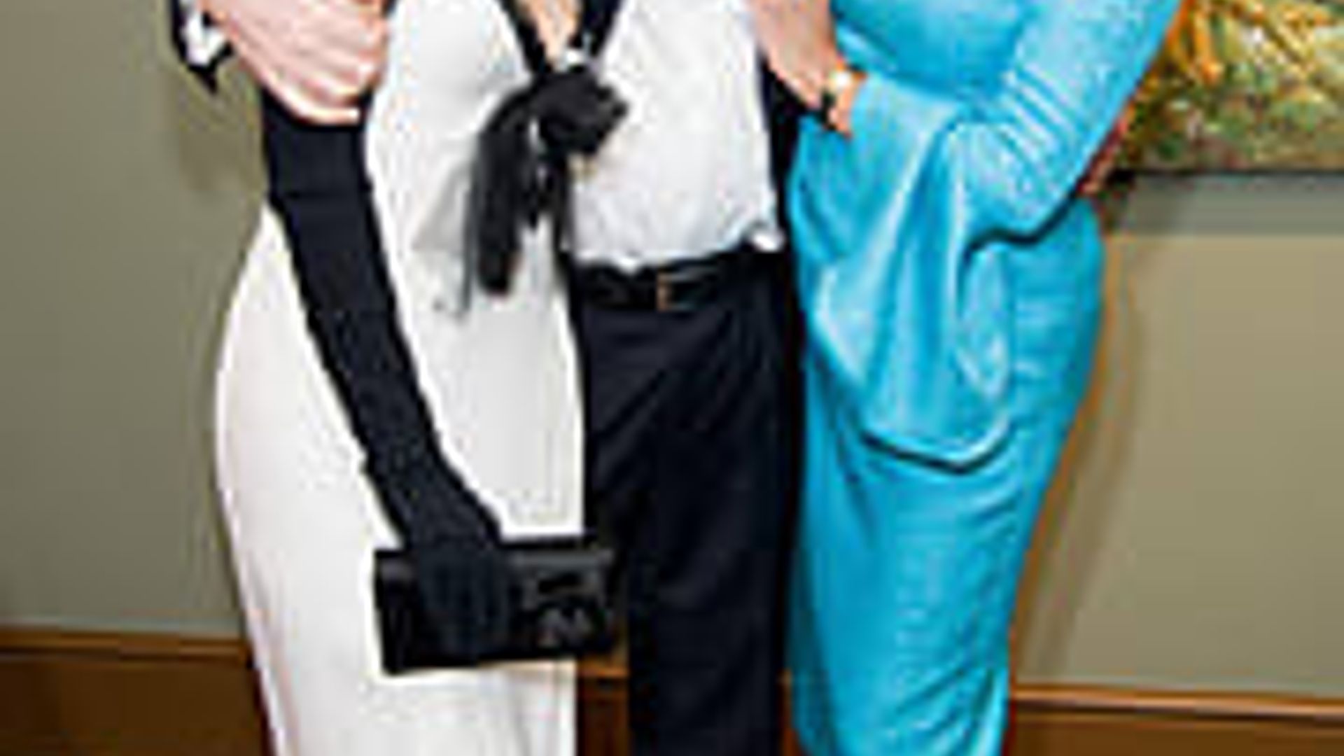 Joan adds her brand of glamour to son Sacha's art launch | HELLO!