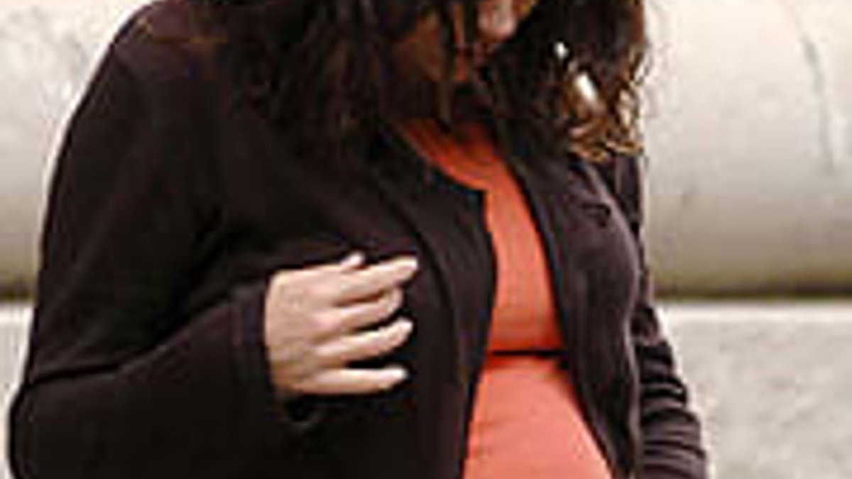 Pregnant Minnie Driver rubbing baby bump in new York | HELLO!