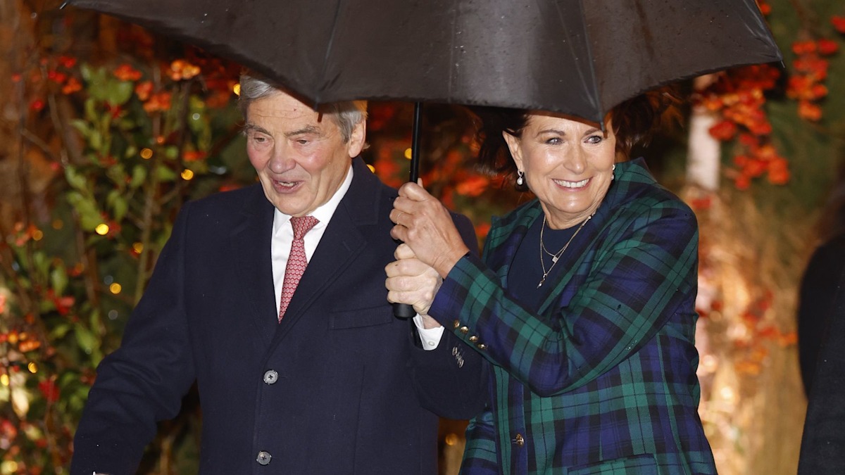 Carole and Michael Middleton put on a united front to support Princess Kate at poignant carol ...