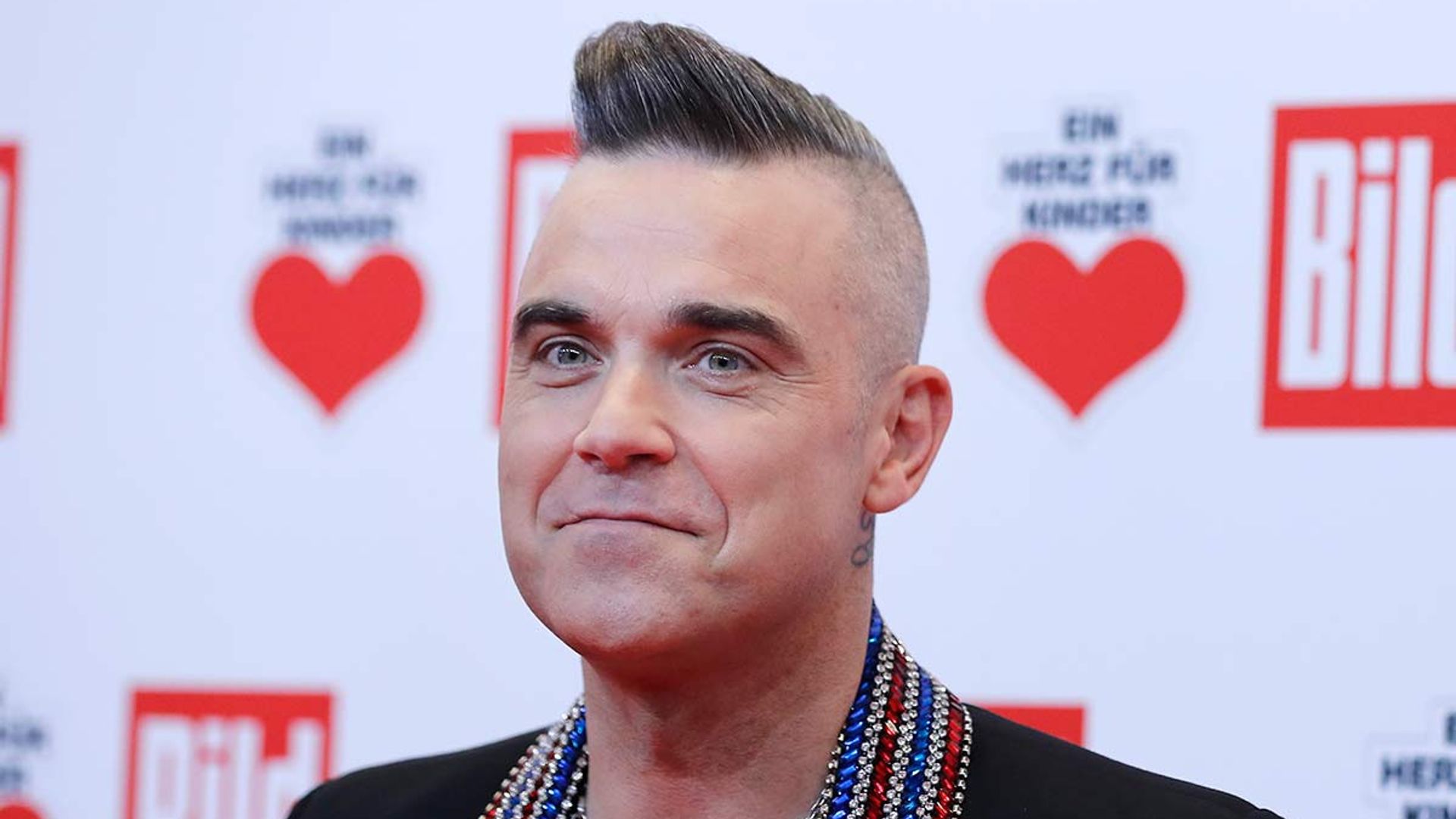Robbie Williams reveals major change to his appearance – and he did it ...