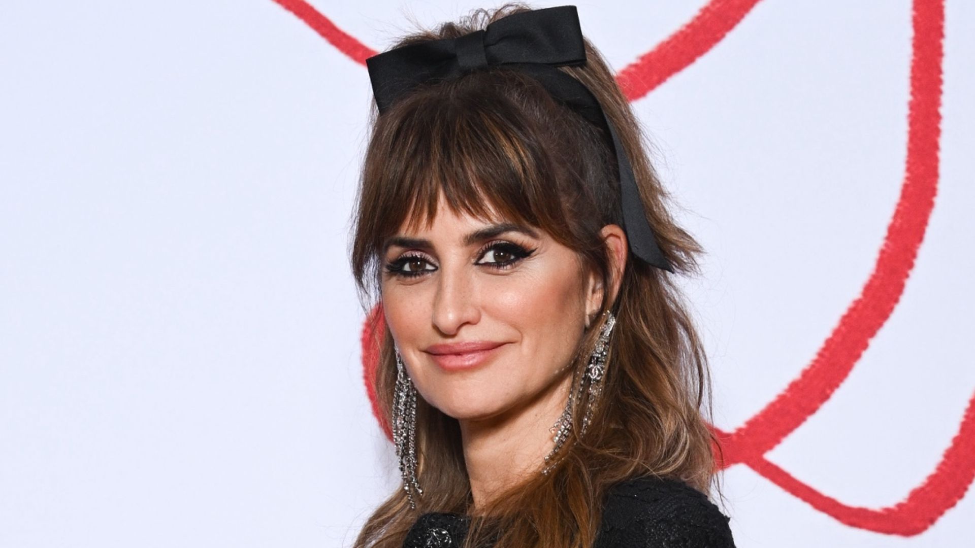 Penelope Cruz turns up the heat posing in a bra and leather jacket | HELLO!