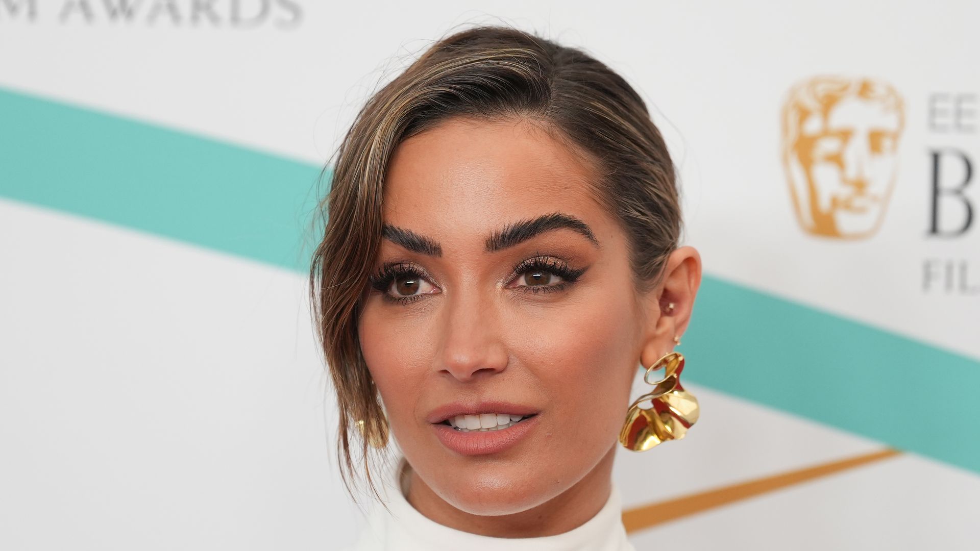 Frankie Bridge looks phenomenal in figure-hugging mini dress and sheer ...