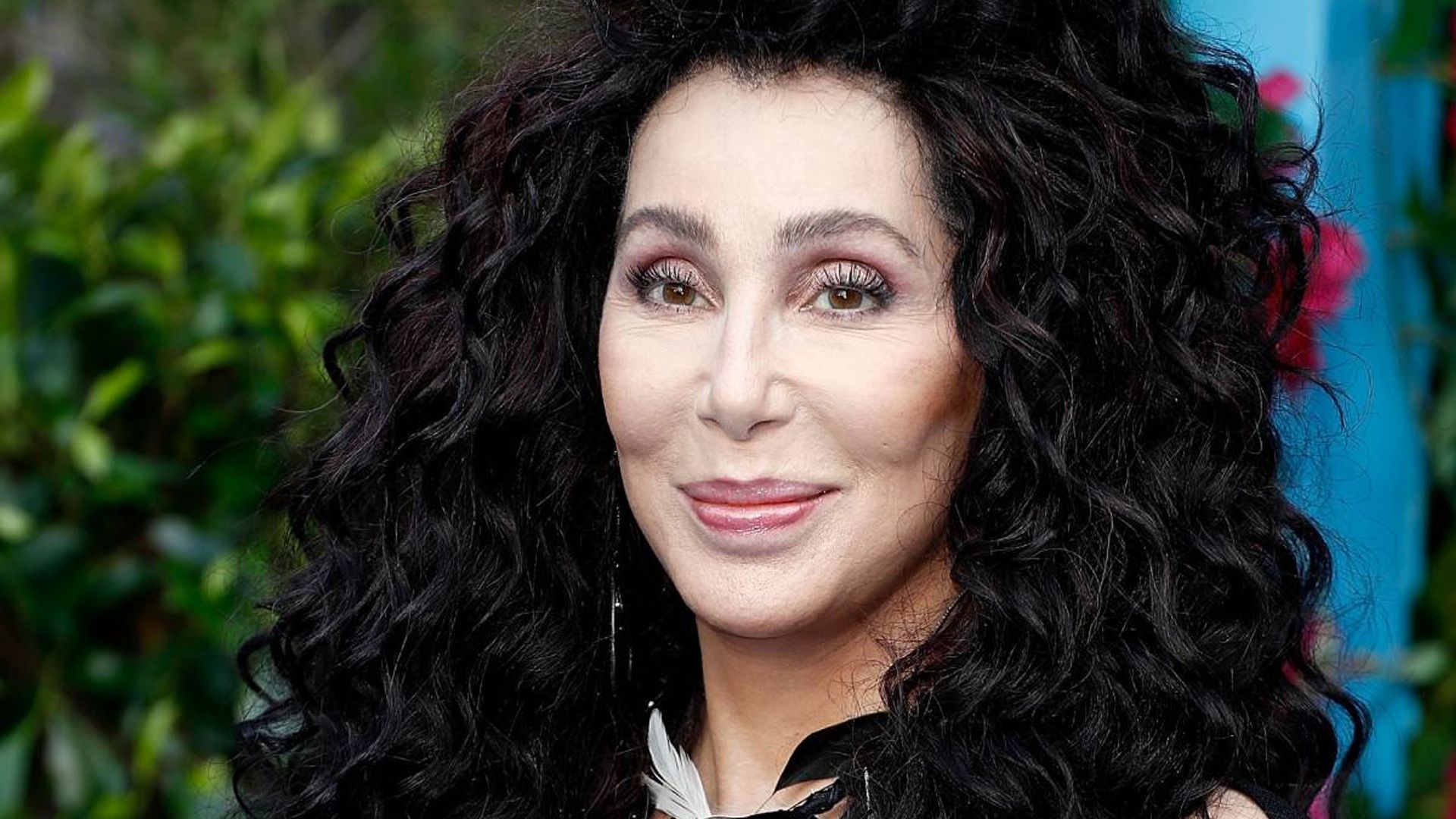 Cher, 76, causes a stir in skin-tight leather catsuit in futuristic new ...