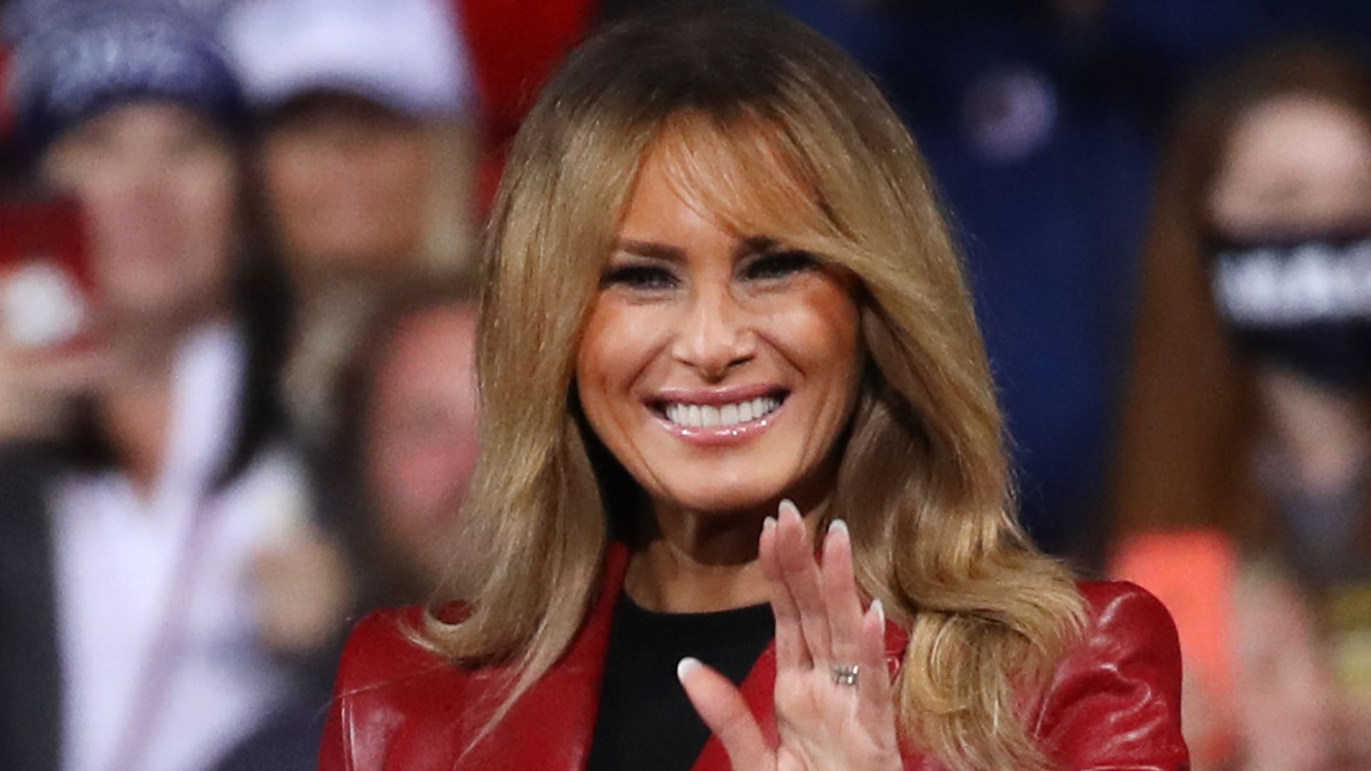 Melania Trump is radiant in red as she makes rare public appearance to ...