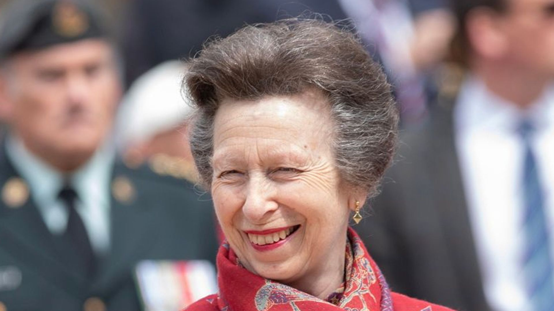 Princess Anne is a vision of colour in the brightest printed jacket and ...