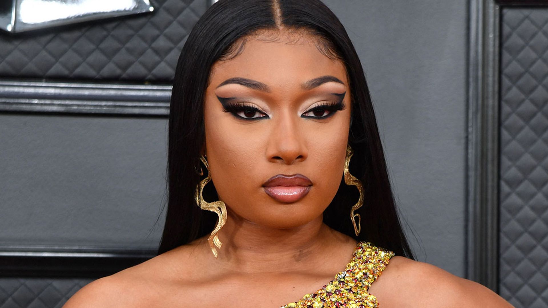 Megan Thee Stallion wows in daring thigh-split dress with surprising ...
