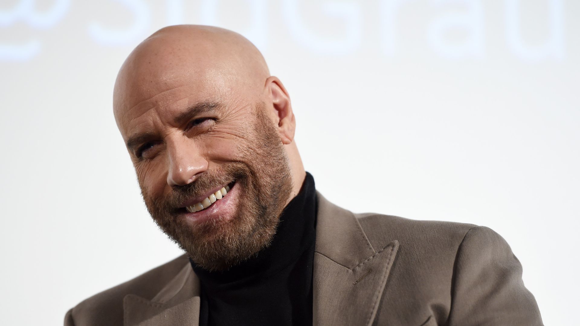 John Travolta says he's 'really happy' as he shares heartwarming ...