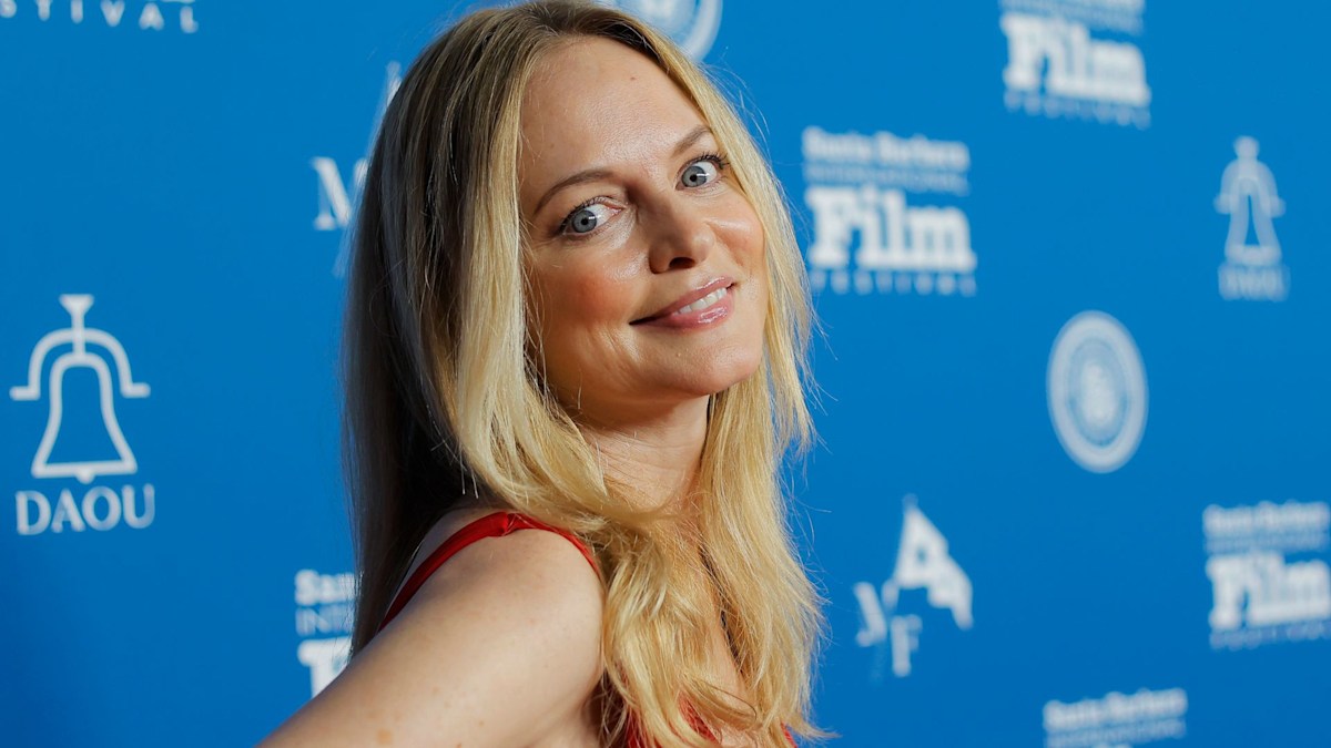 Heather Graham, 54, is a blonde bombshell in striking red dress | HELLO!