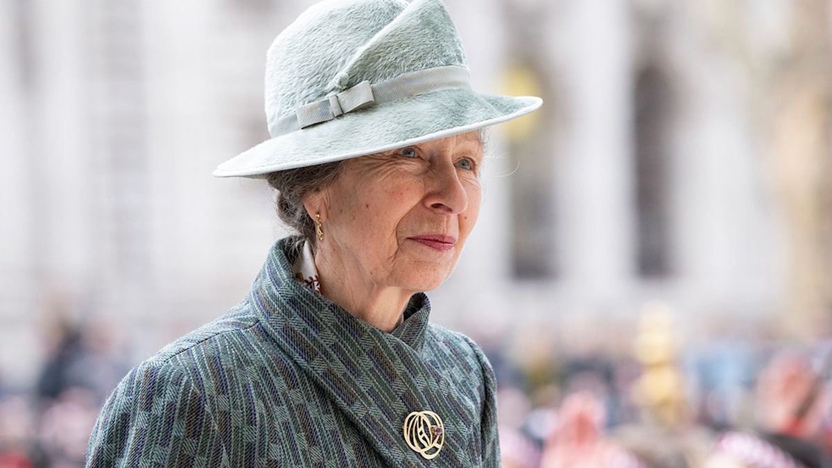 Princess Anne delights in recycled bold tartan look during the rugby ...