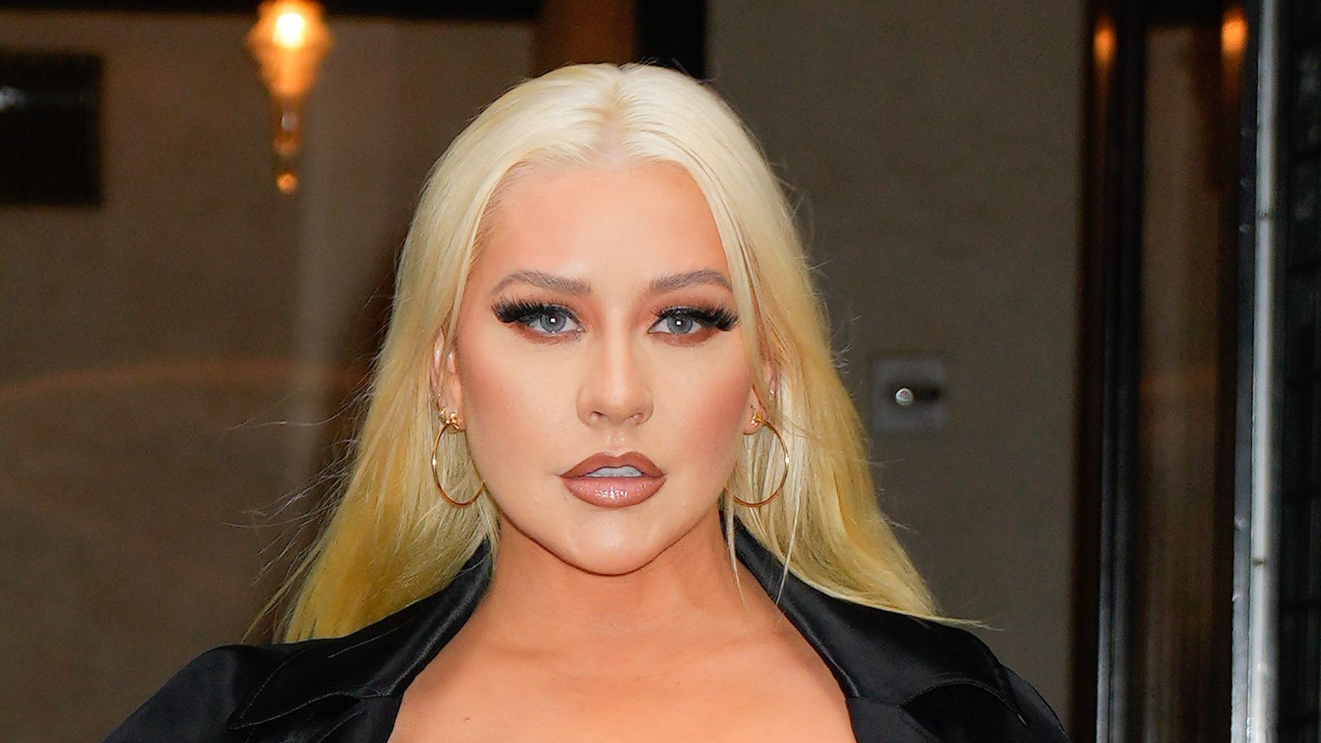 Christina Aguilera glows in leather look for rare family outing | HELLO!