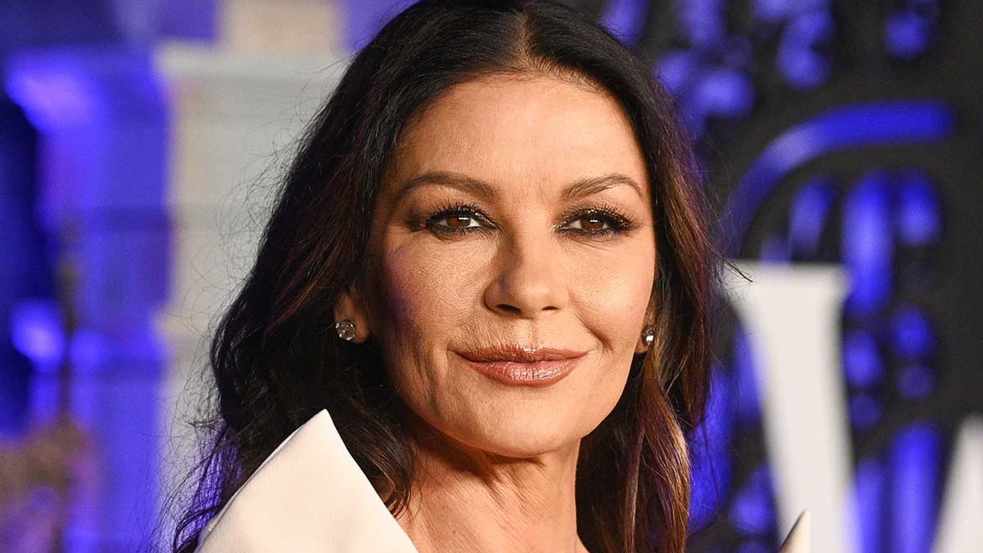 Catherine Zeta-Jones makes a splash in seriously figure-hugging mermaid ...