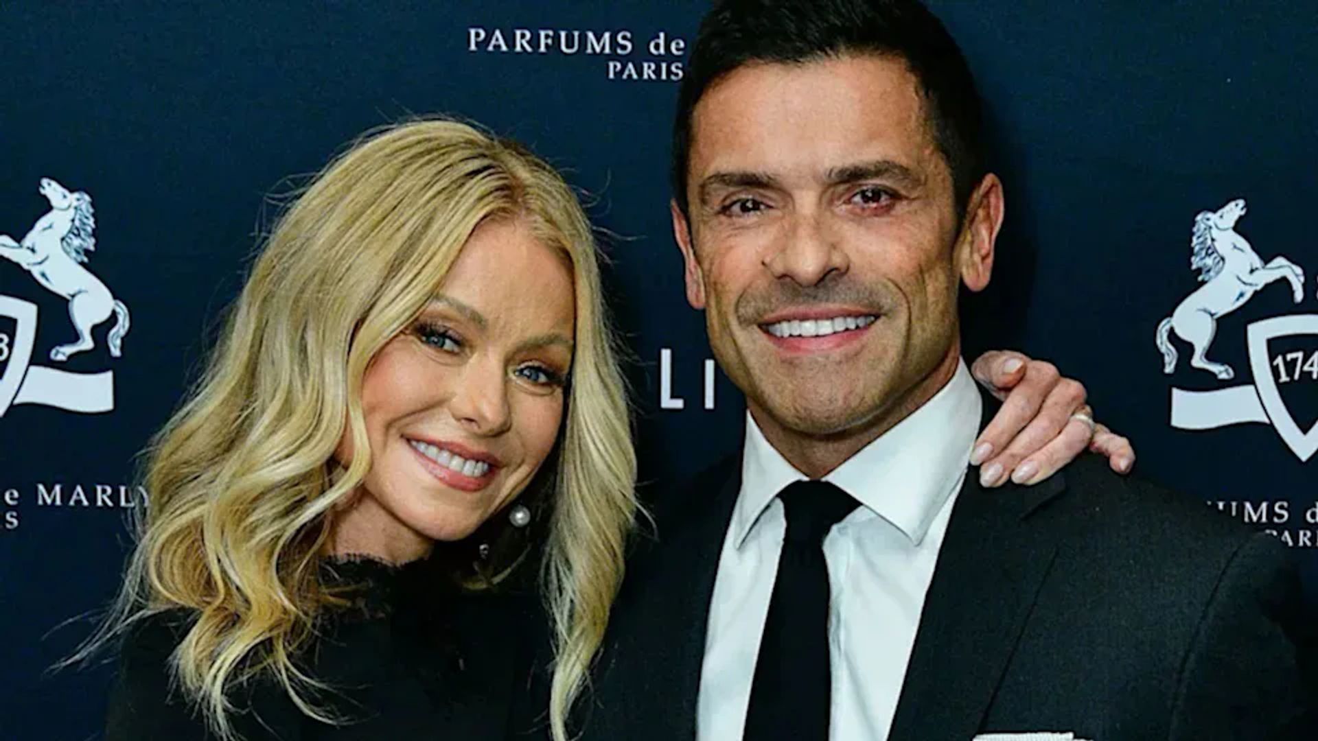 Kelly Ripa gets into awkward position with husband Mark Consuelos ...