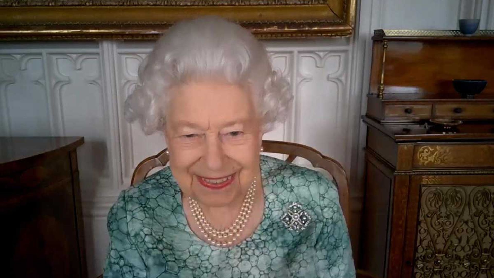 The Queen reappears to charm scientists after Harry and Meghan's ...