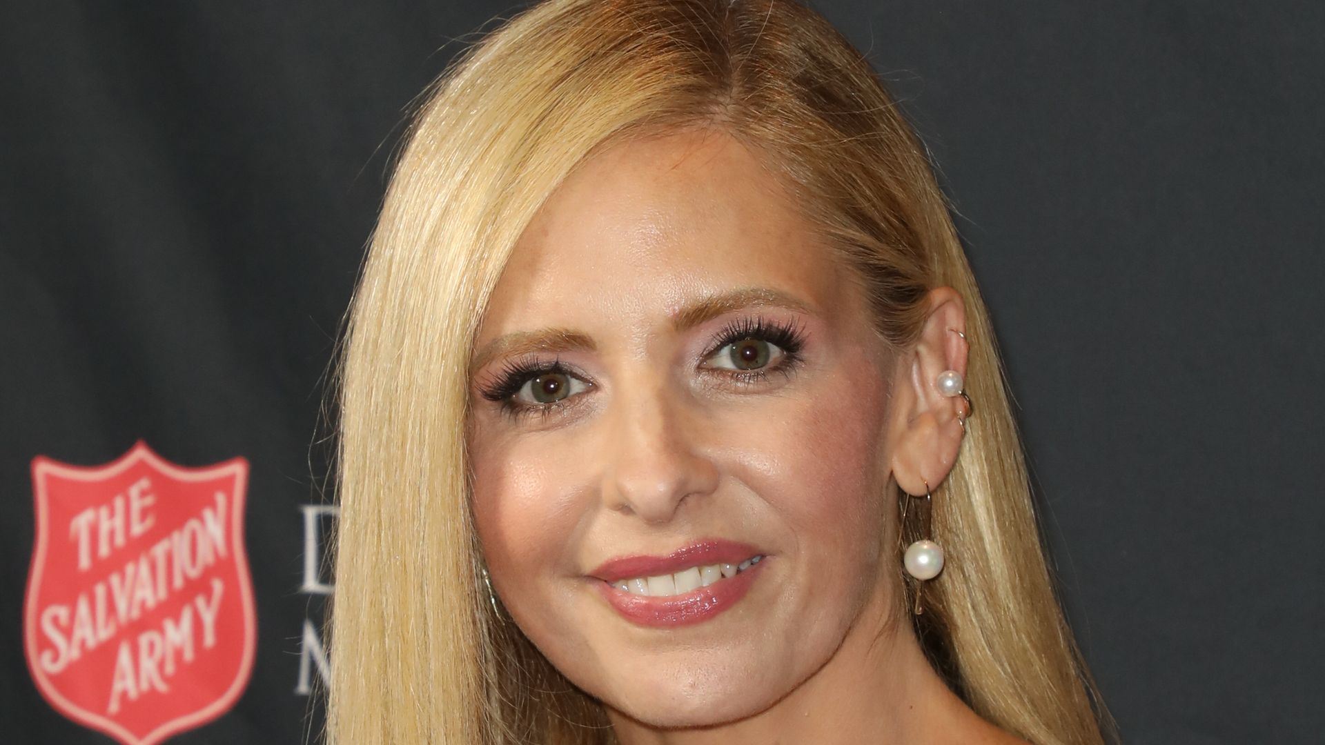 Sarah Michelle Gellar is a sun-kissed goddess in risque swimsuit photos ...