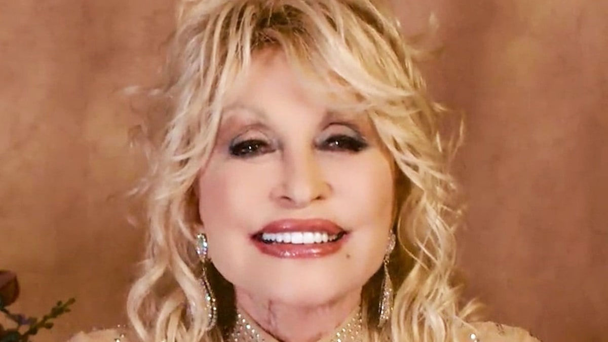 Dolly Parton, 77, sparkles in figure-hugging bodysuit for age-defying ...