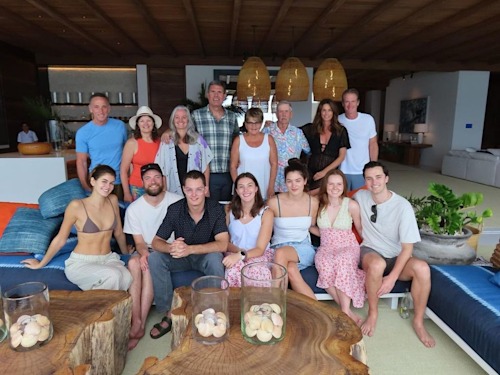 Cindy Crawford, 57, sparkles in glamorous mini dress as she cuddles up ...