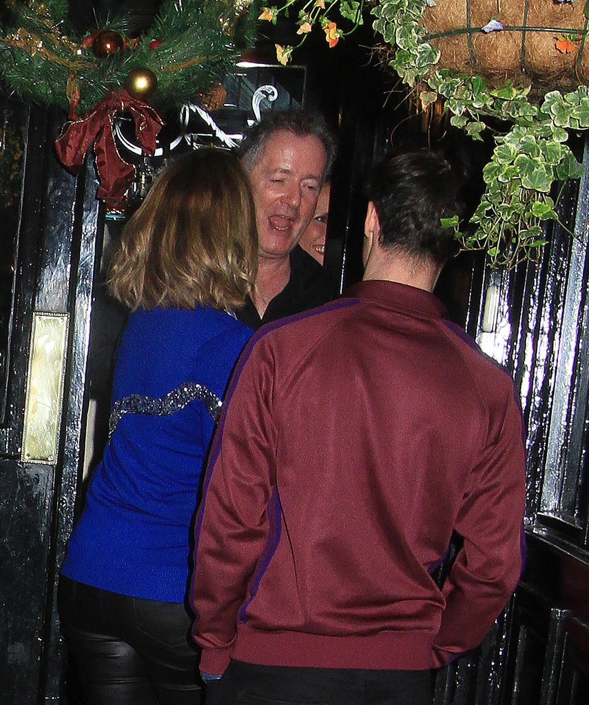 Piers Morgan is all smiles as he reunites with Susanna Reid at star ...