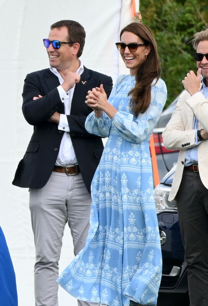 Peter Phillips enjoys a laugh with Kate Middleton at cousin William's ...