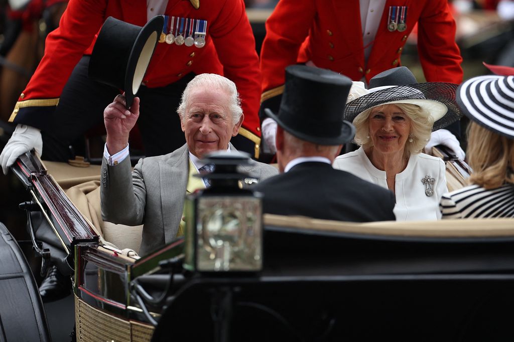 King Charles beams as he's joined by Queen Camilla and Princess Eugenie ...
