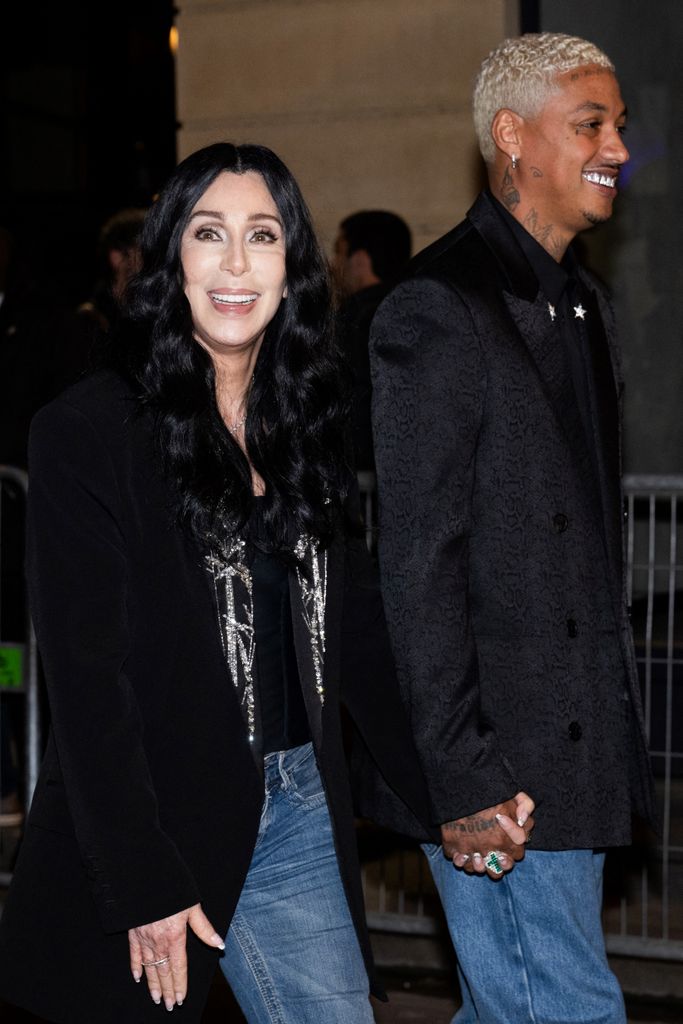 Cher, 77, looks incredible as she twins with boyfriend Alexander Edward ...