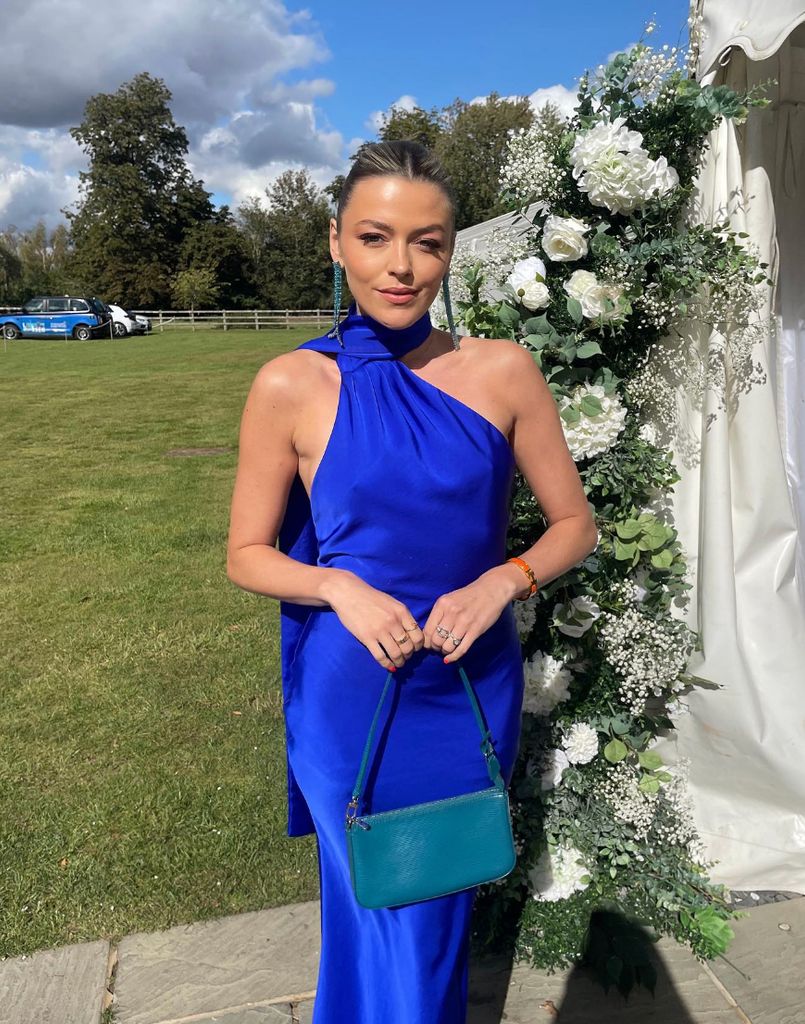 Neck scarf dresses are the standout hit for autumn occasions says one ...