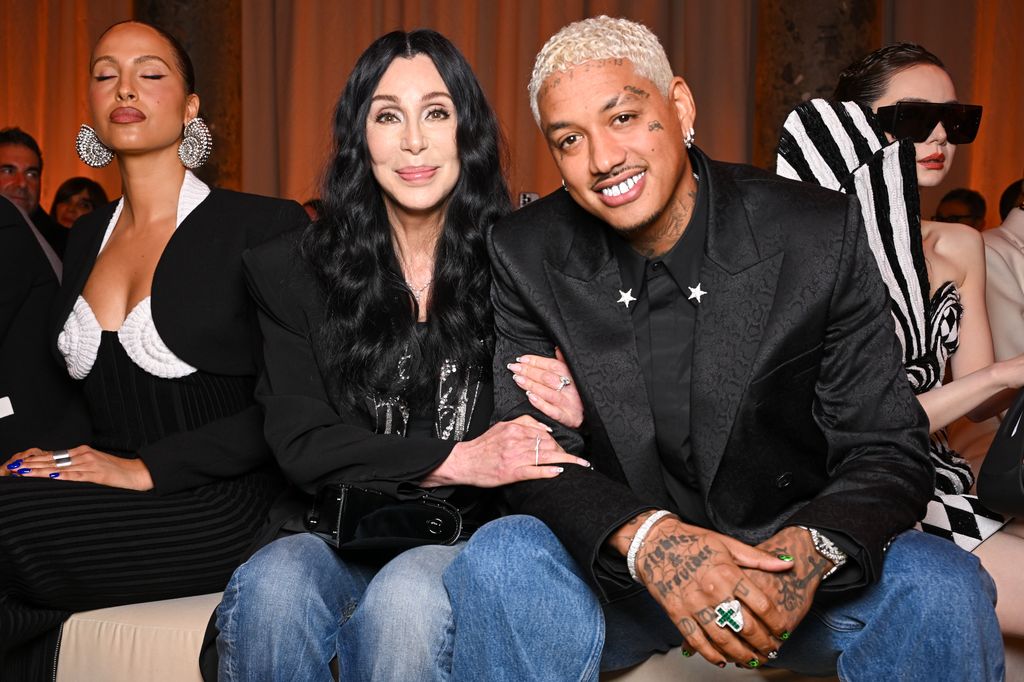Cher stuns in daring look with unexpected hair alongside Alexander ...