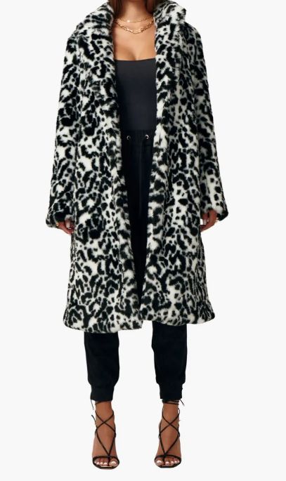 Ciara divides fans as she poses up a storm in showstopping coat | HELLO!