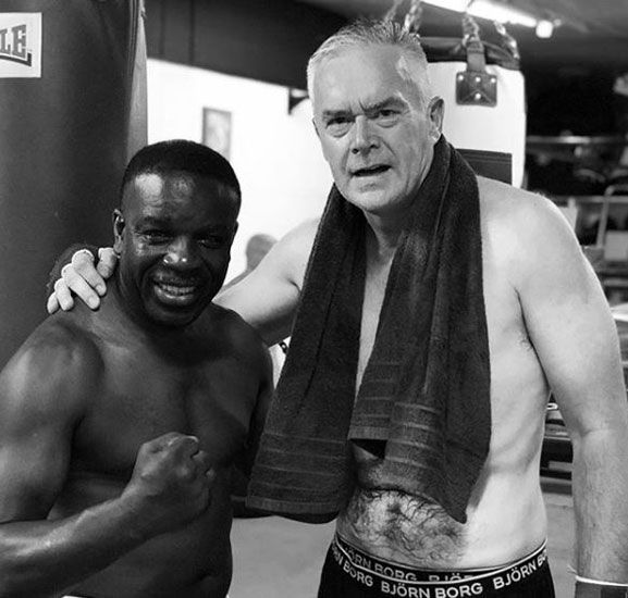 BBC News presenter Huw Edwards shows off toned torso following three ...