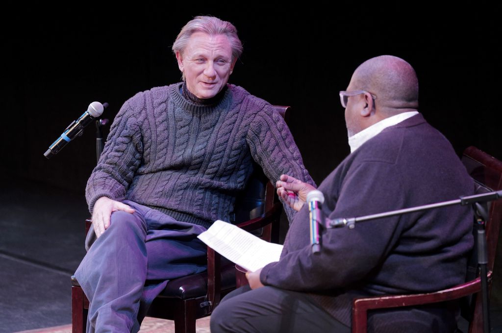 Daniel Craig surprises in cable knit sweater and slippers as he ...