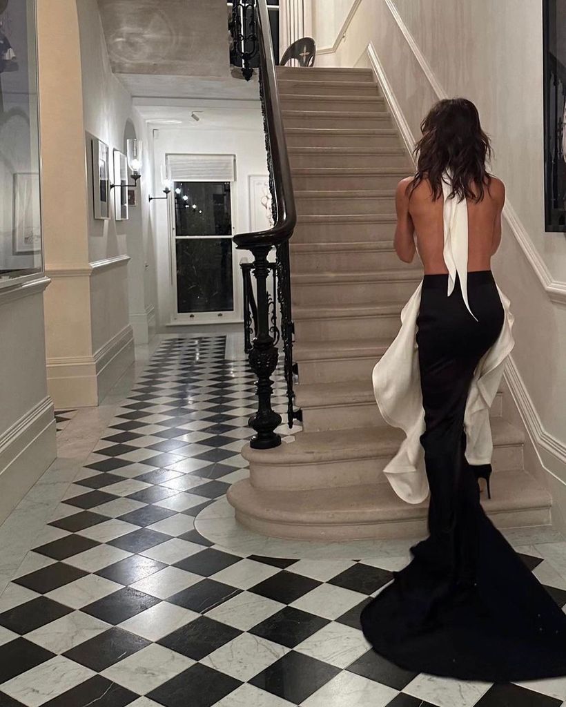Victoria Beckham models divisive backless 'maid' dress inside grand £ ...