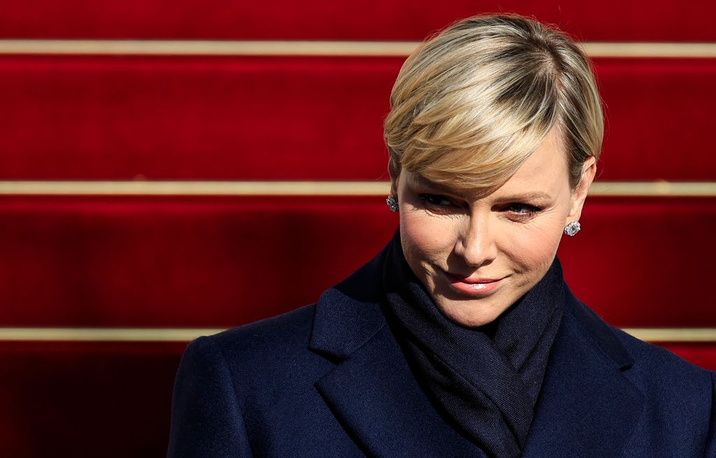 Princess Charlene looks like a film star in power suit alongside ...