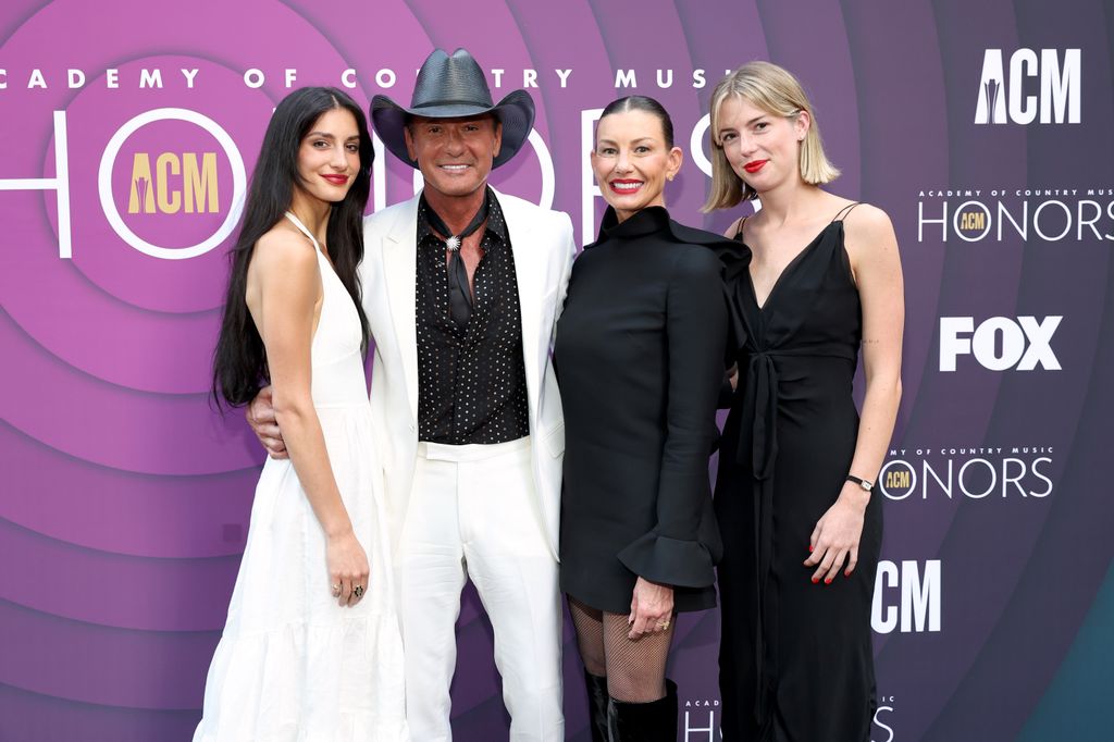 Tim McGraw seen with a cane as he's supported by Faith Hill in rare ...