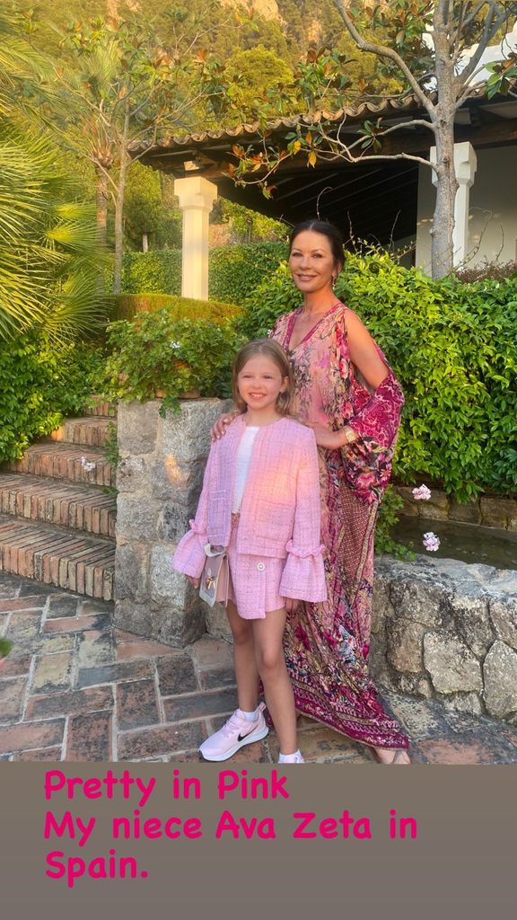 Catherine Zeta-Jones is a bronzed goddess in sheer pink beach dress ...
